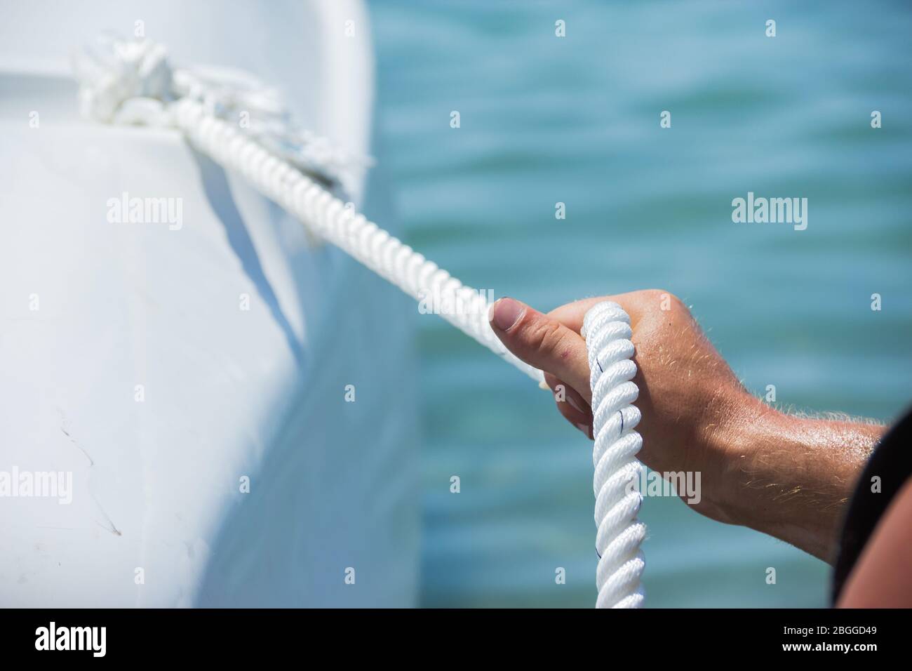 Tied hands anchor hi-res stock photography and images - Alamy