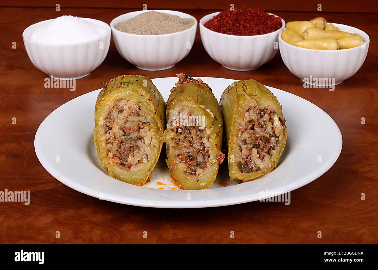 very nice stuffed zucchini with Turkish fragrant spices on white plate ...