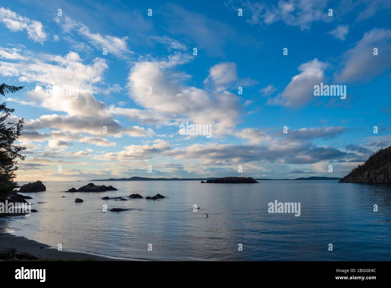 Landscape of water, rocks and clouds in the Pacific Northwest Stock ...