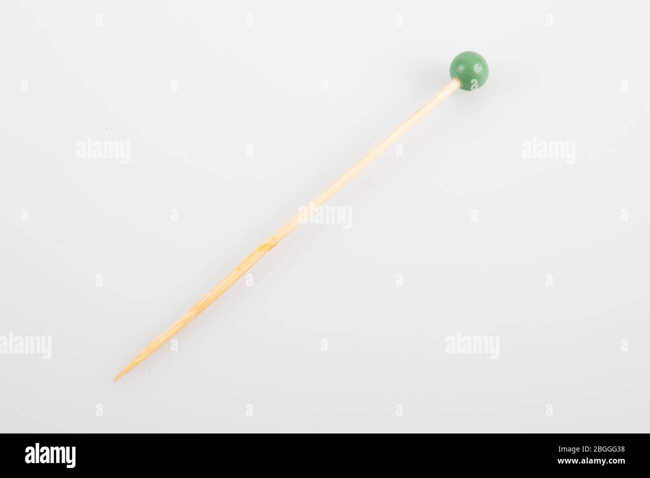 Natural wooden toothpicks green ball isolated on white background Stock ...