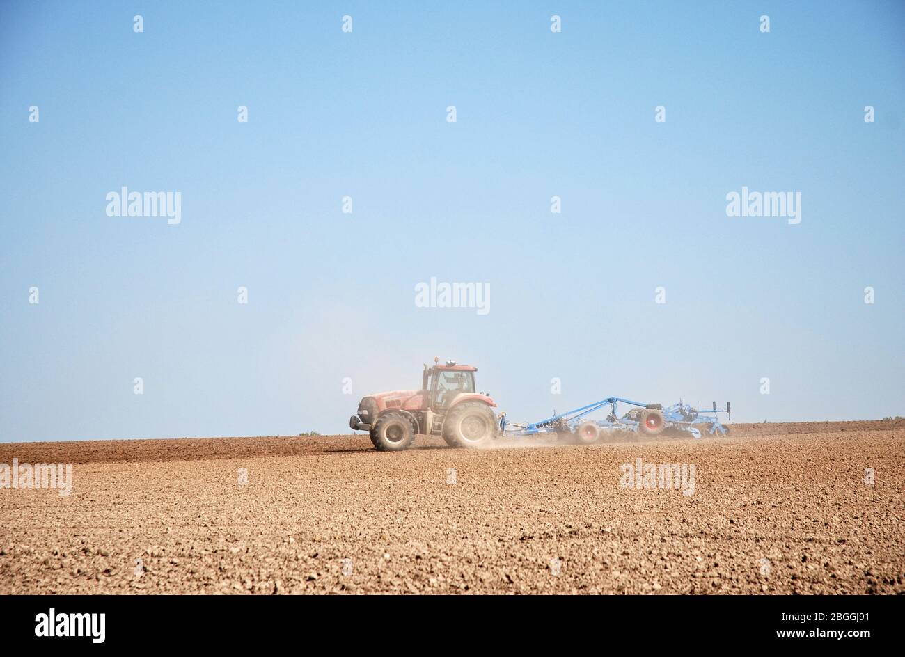 Field work in spring Stock Photo - Alamy