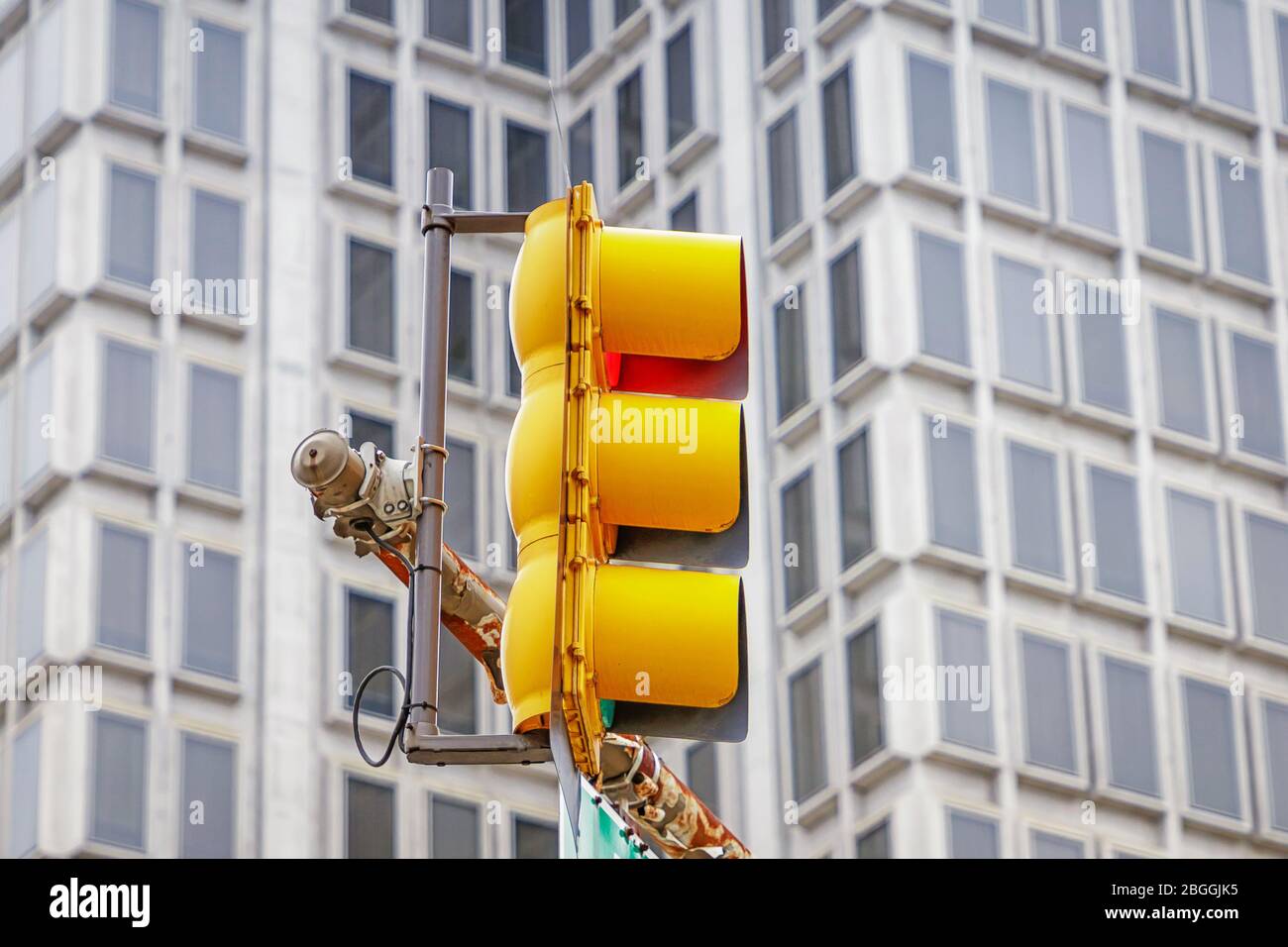 Bright yellow traffic lights on the gray windows pattern background ...