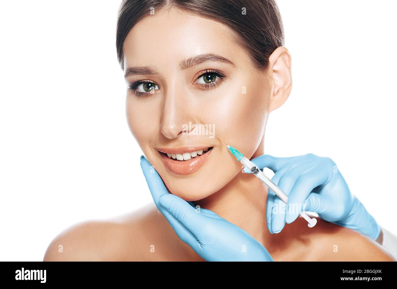 Smiling woman received procedure lifting skin. beauty injections into ...