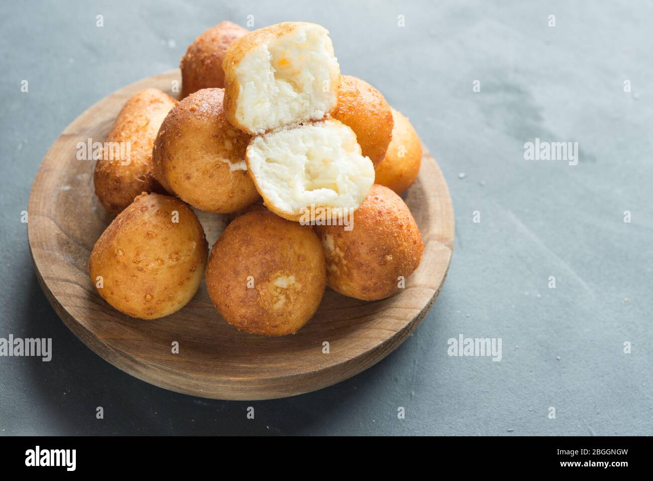 Traditional Colombian buñuelo - Deep Fried Cheese Bread Stock Photo - Alamy