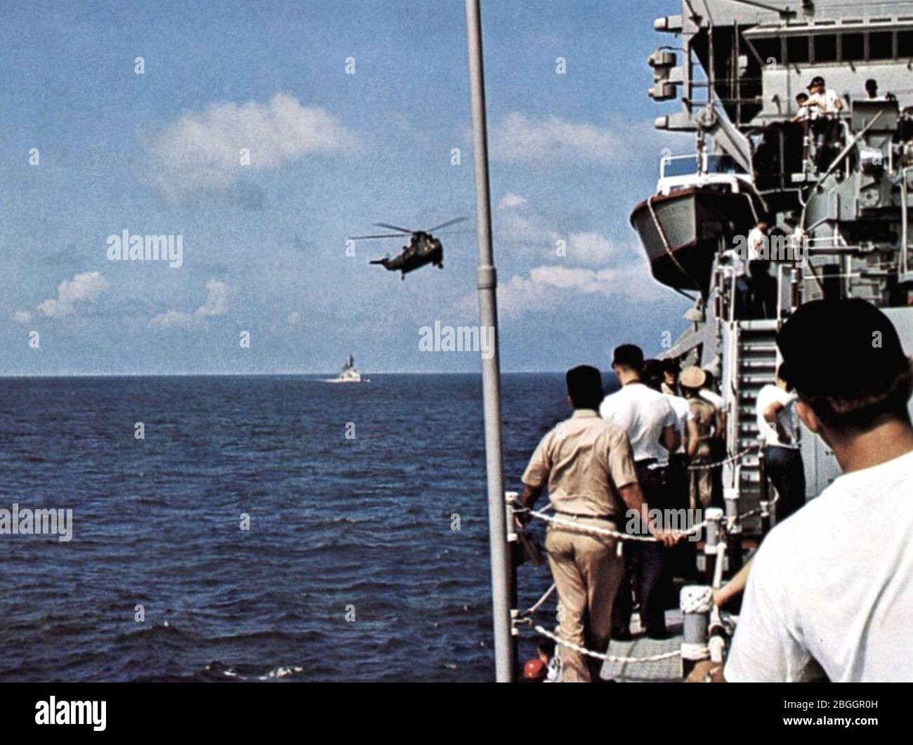 HH-3A of HC-7 approaches USS Long Beach (CGN-9) off Vietnam c1969 Stock ...