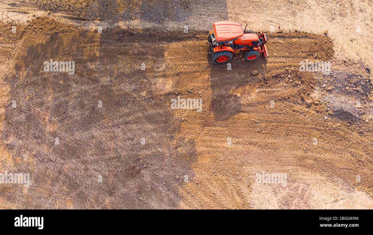 The top view of a tractor is working Stock Photo - Alamy