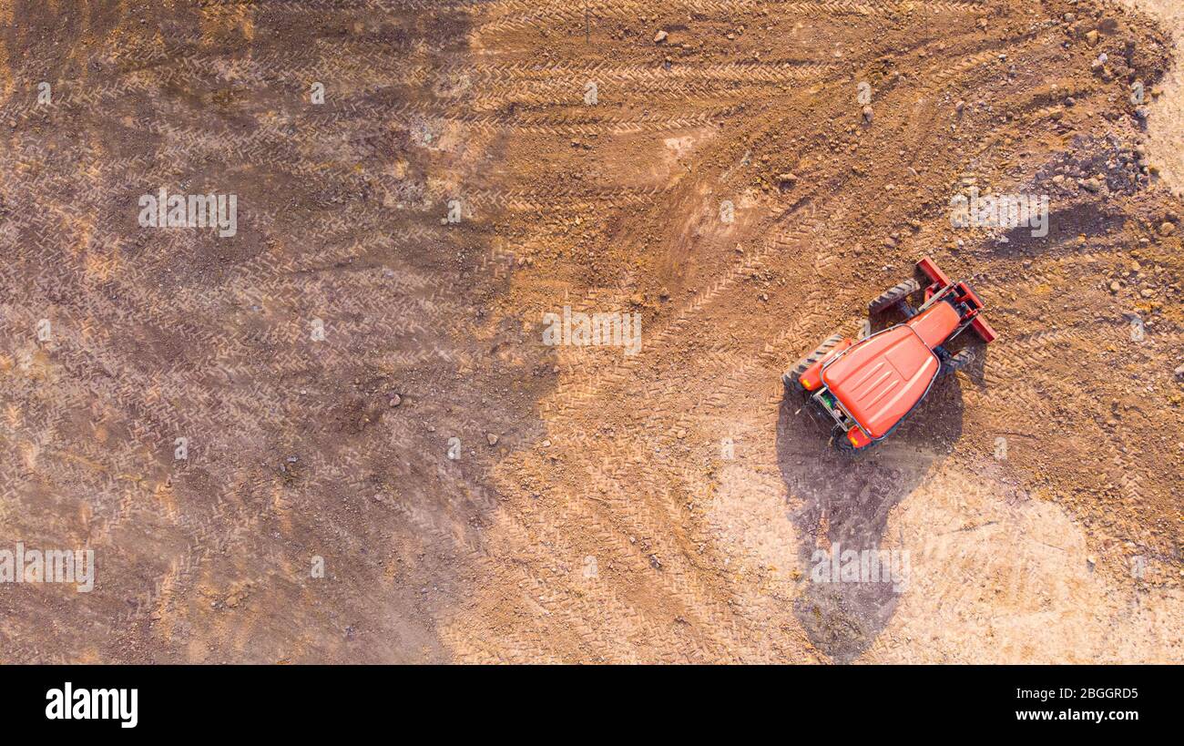 The top view of a tractor is working Stock Photo - Alamy