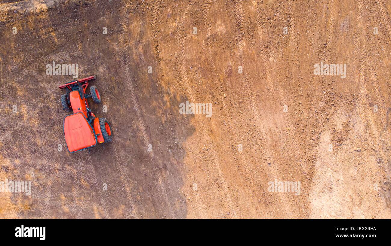 The top view of a tractor is working Stock Photo - Alamy