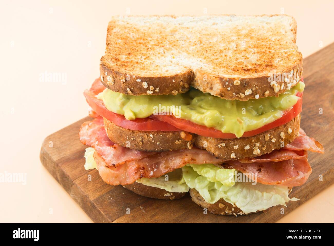 Sandwich LGBT lettuce, guacamole, bacon and tomato Stock Photo - Alamy