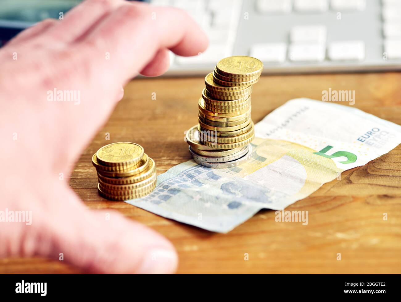 Money grabbing hi-res stock photography and images - Alamy
