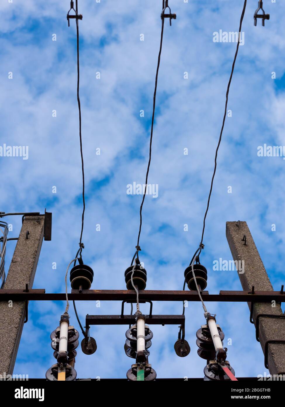 Electricity power cables connection to the grid; three power lines and ...