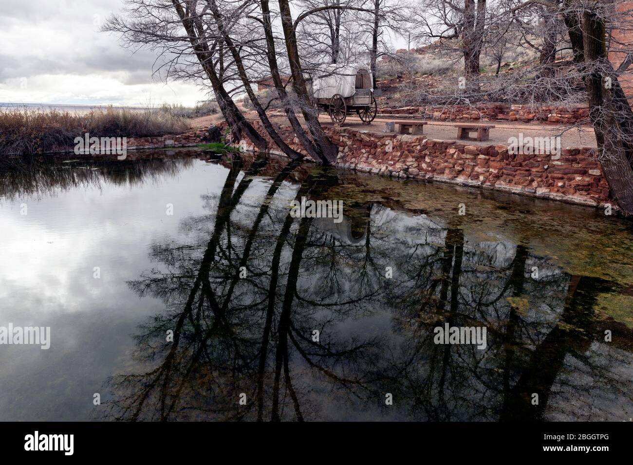 AZ00416-00...ARIZONA - Pond and pioneer wagon in Pipe Springs National ...