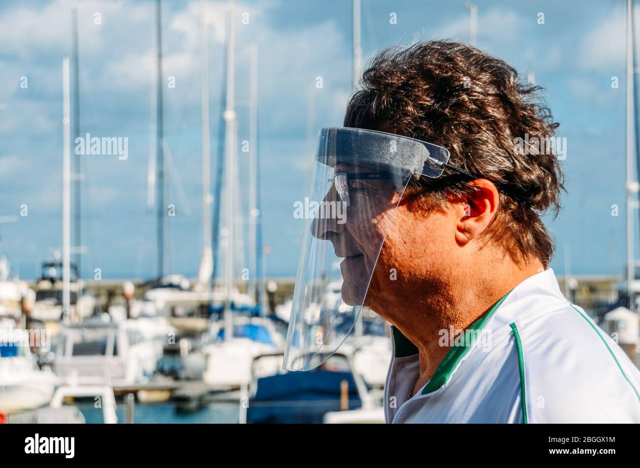 Older man wearing Adjustable Anti Droplet Full Face Cover Mask Visor ...