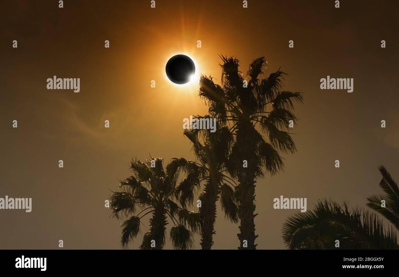 Total solar eclipse in dark red glowing sky, amazing natural phenomenon ...