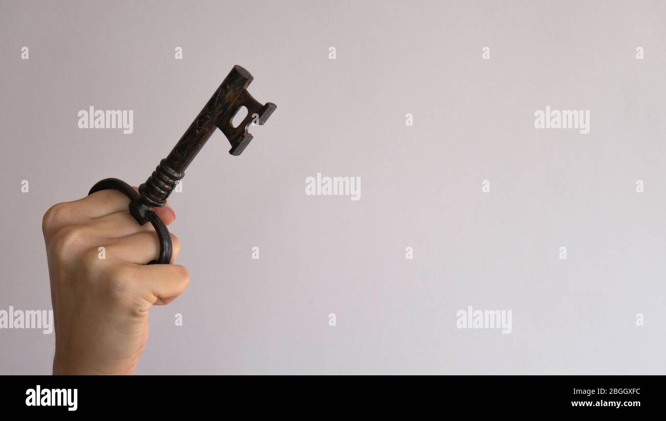Corkscrew for opening bottles in the form of a key in a woman's right ...