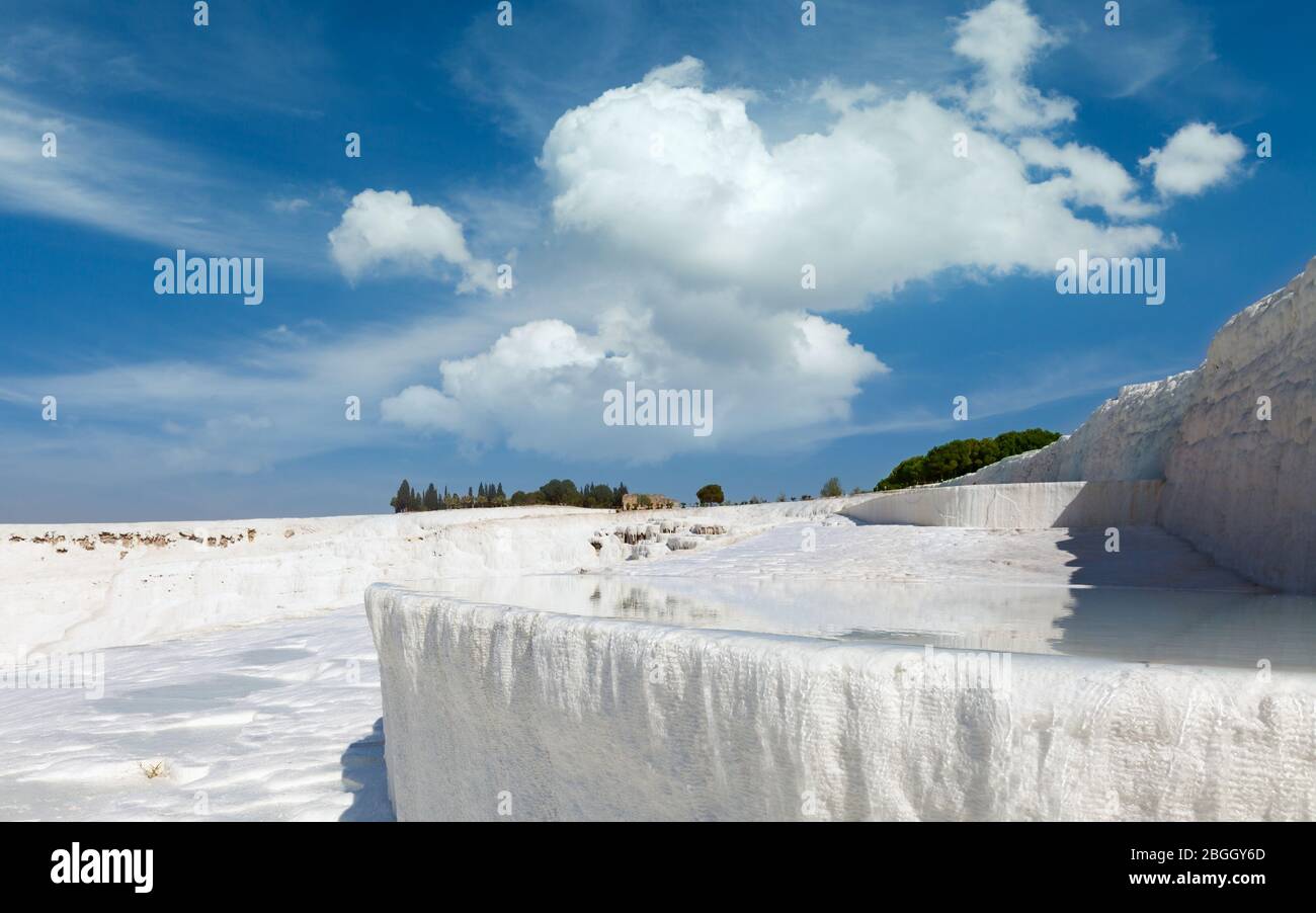 Amazing white travertine terrace formations, pool with clear hot water ...