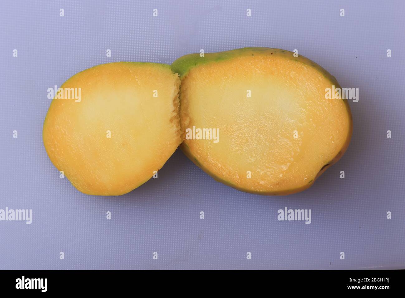 Fresh Yellow Mango fruit isolated on white background Stock Photo - Alamy