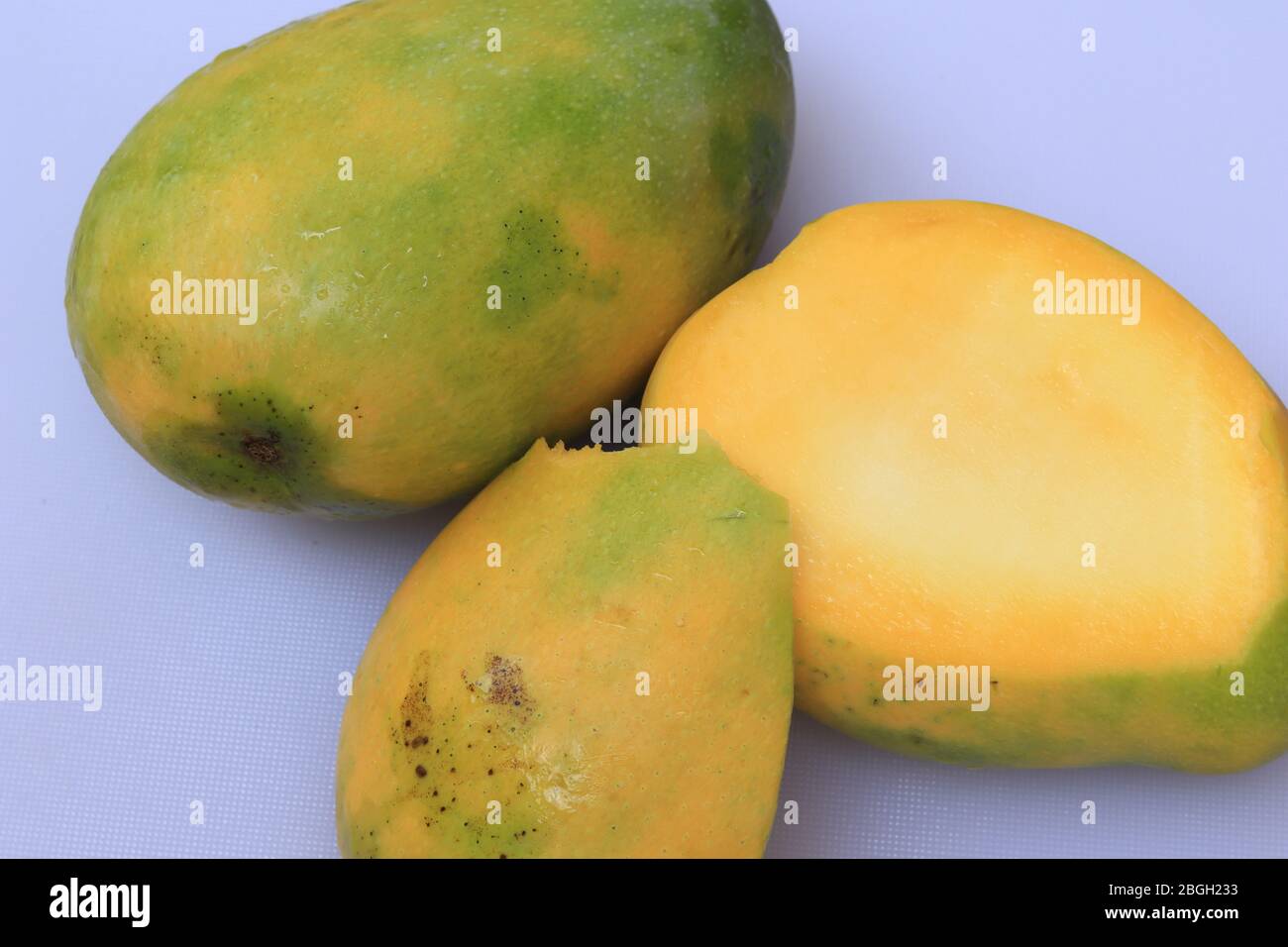Fresh Yellow Mango fruit isolated on white background Stock Photo - Alamy