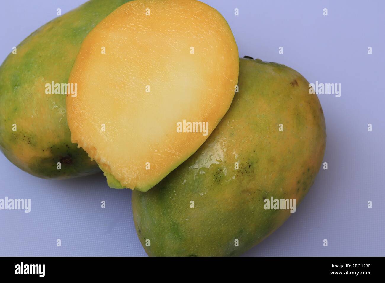 Fresh Yellow Mango fruit isolated on white background Stock Photo - Alamy