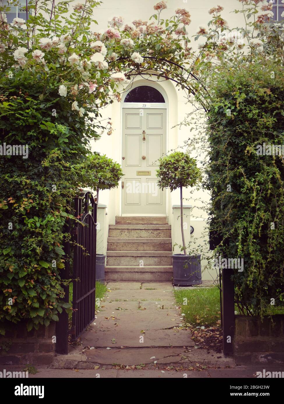 Residential Door with Raised Arch Stock Photo - Alamy