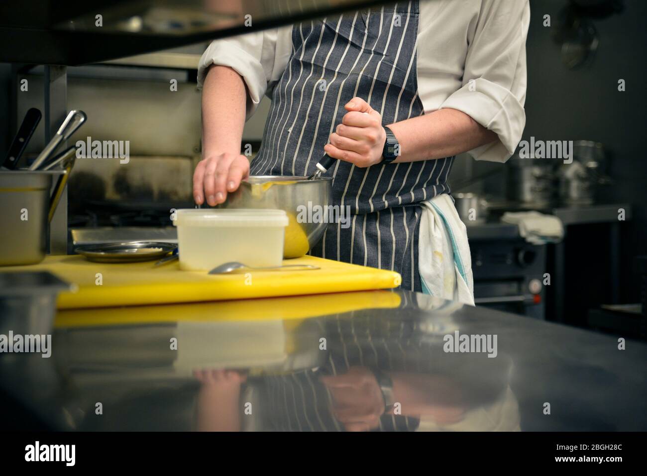 Professional Chef mixing in Bowl Stock Photo - Alamy