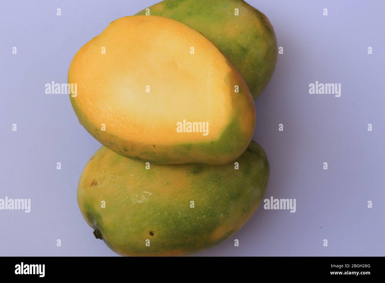 Fresh Yellow Mango fruit isolated on white background Stock Photo - Alamy