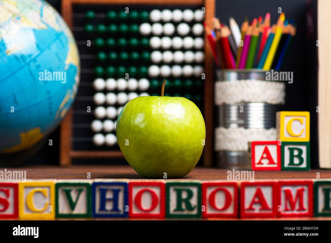 School and education accessories in front of the blackboard in the ...