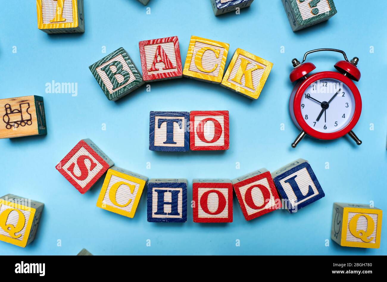 Back to school note written with wooden letters, education and alphabet ...