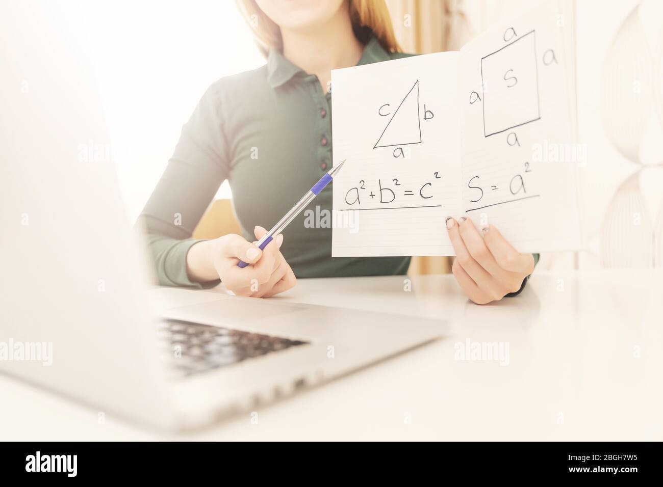 Math teacher explains online lesson to students School quarantine ...