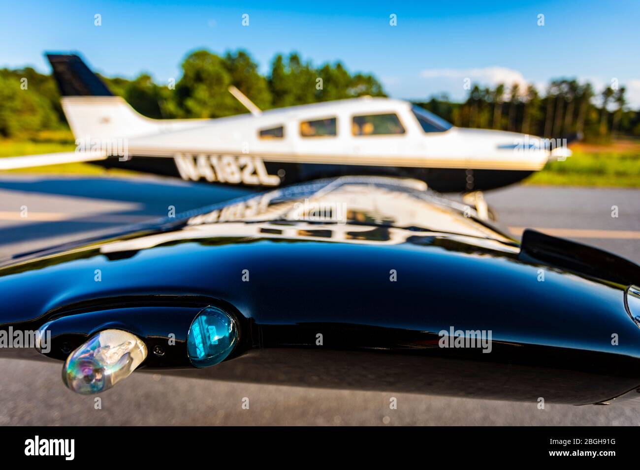 Wing lights on a Piper Archer III general aviation aircraft Stock Photo ...