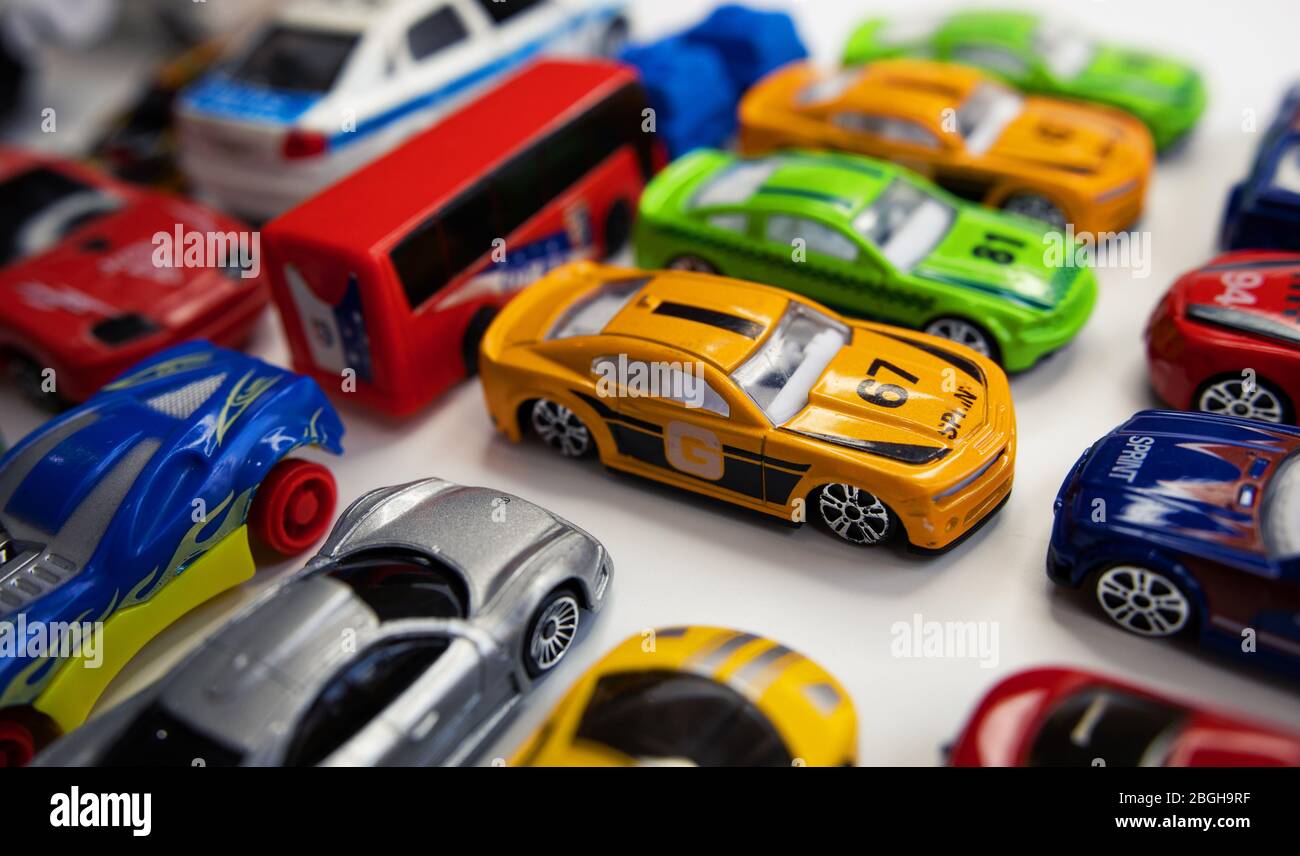 Toy cars of different colors arranged on a white background Stock Photo ...