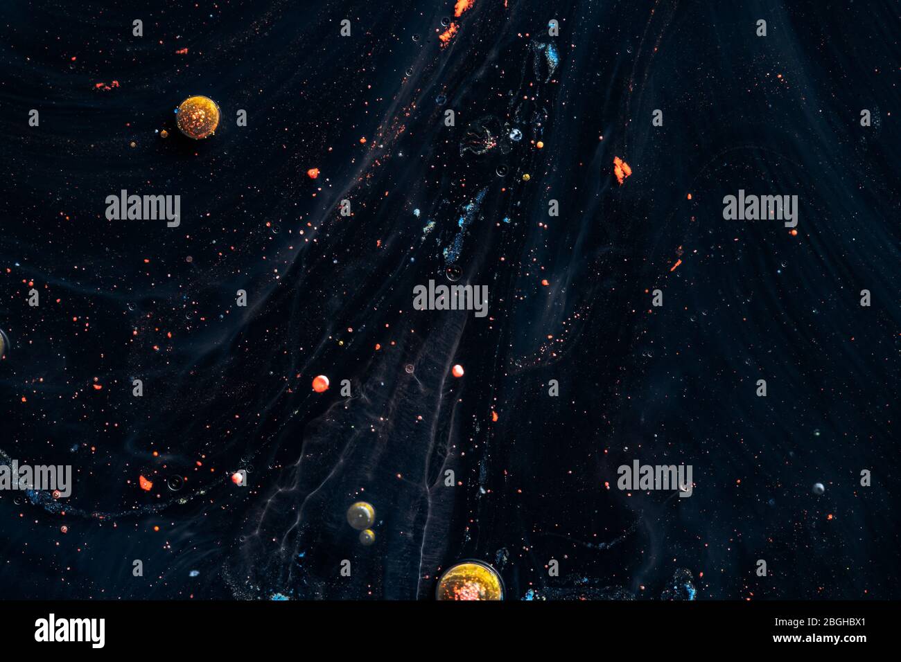 Macro photography with paint oil and milk hi-res stock photography and ...