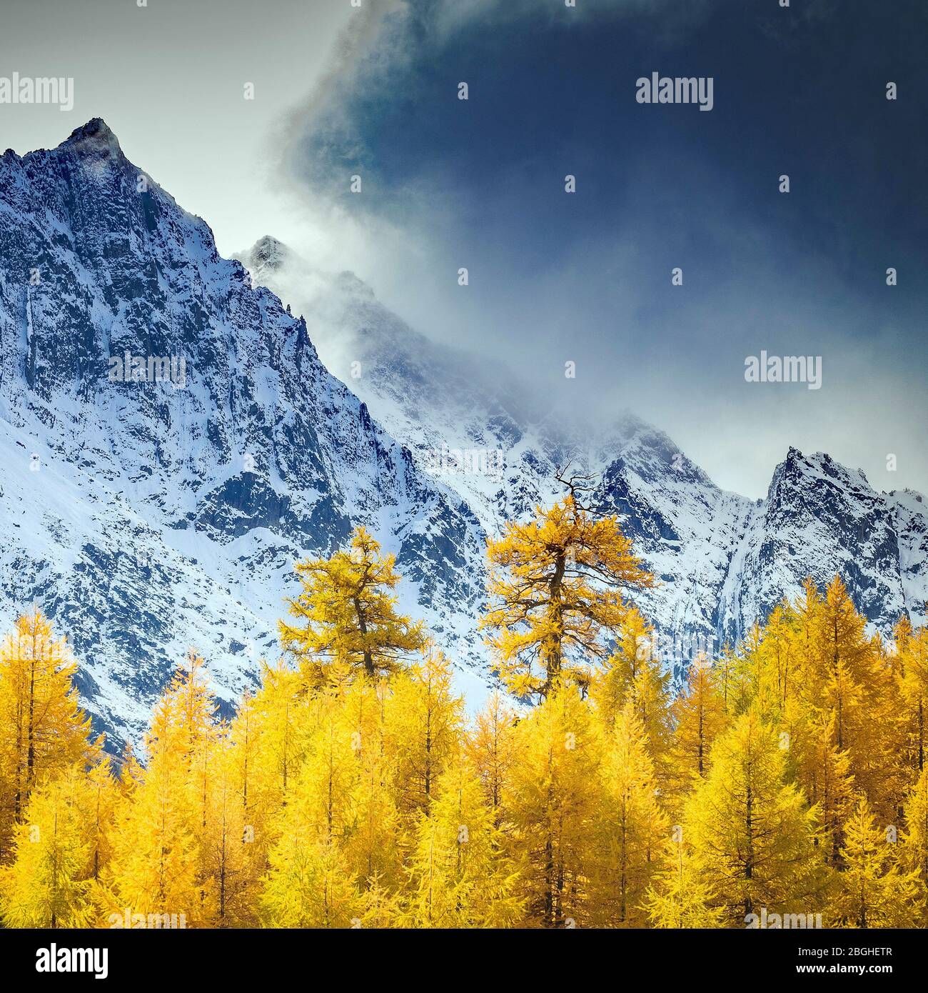autumn vs. winter - alpine landscape Stock Photo - Alamy