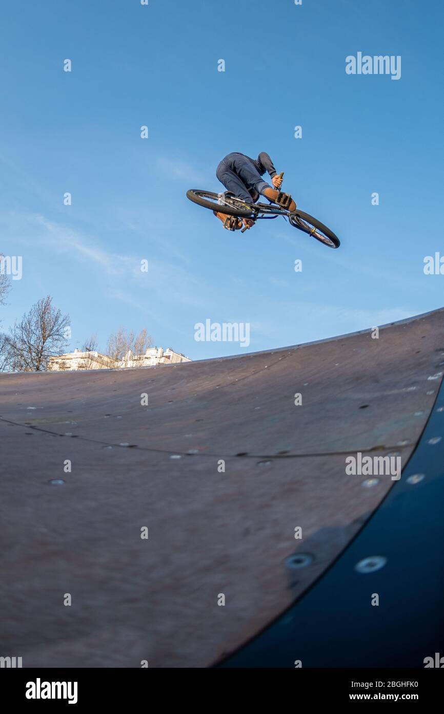 High BMX jump in a skate park Stock Photo - Alamy