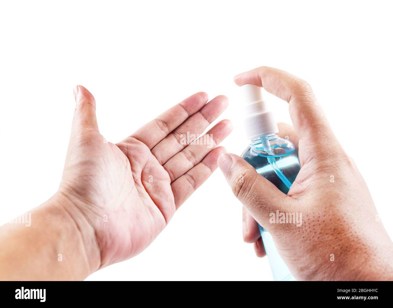 Hands using wash hand sanitizer gel pump dispenser on white background ...