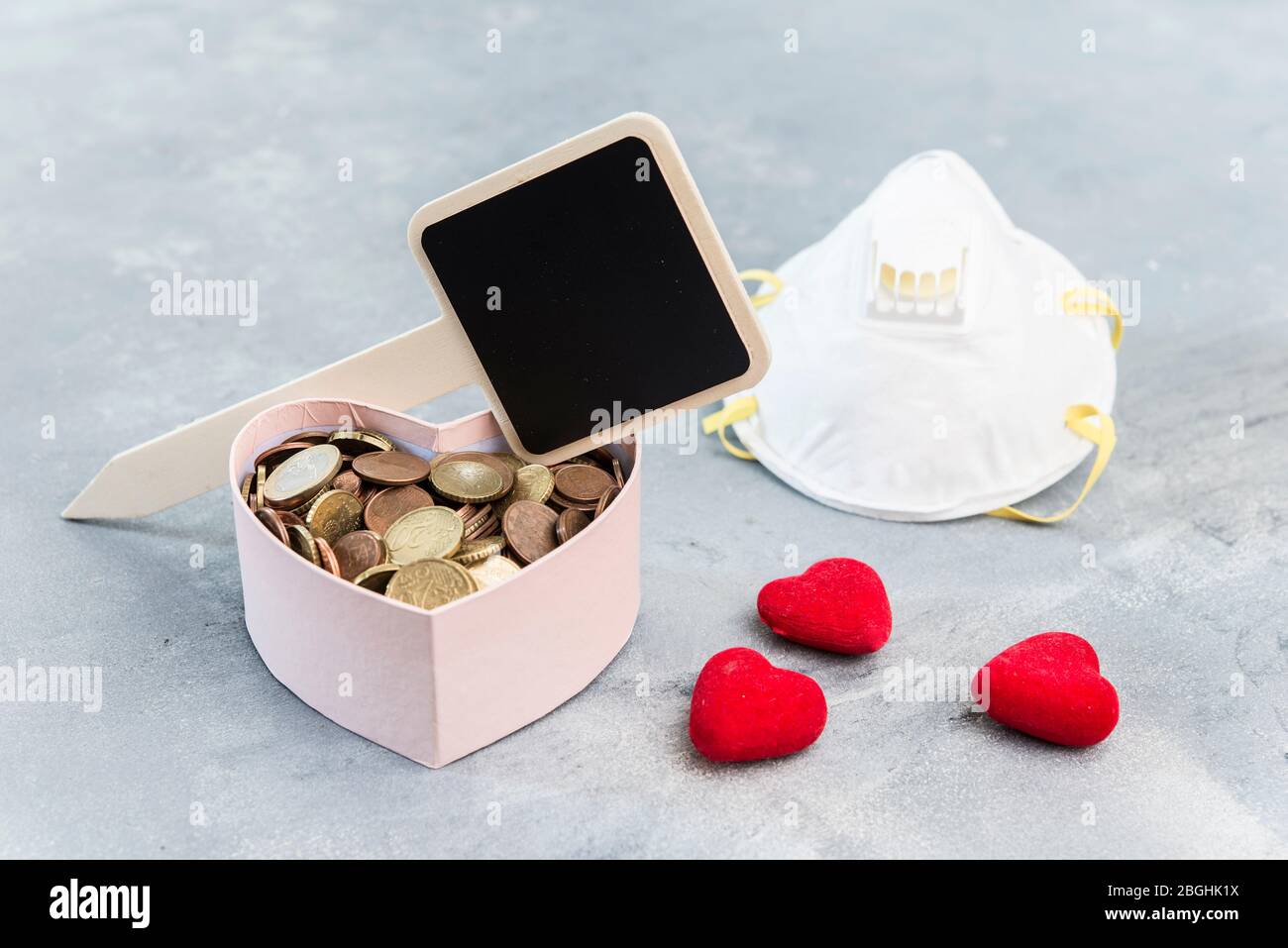Donation box heart shaped for emergency Stock Photo - Alamy
