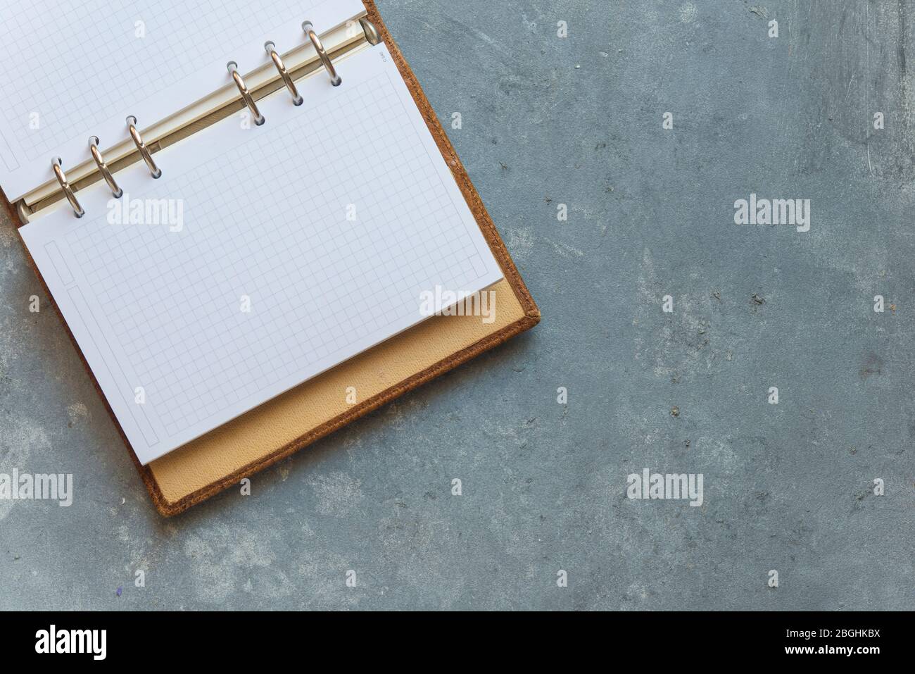 Note book and note paper on a grown background Stock Photo - Alamy