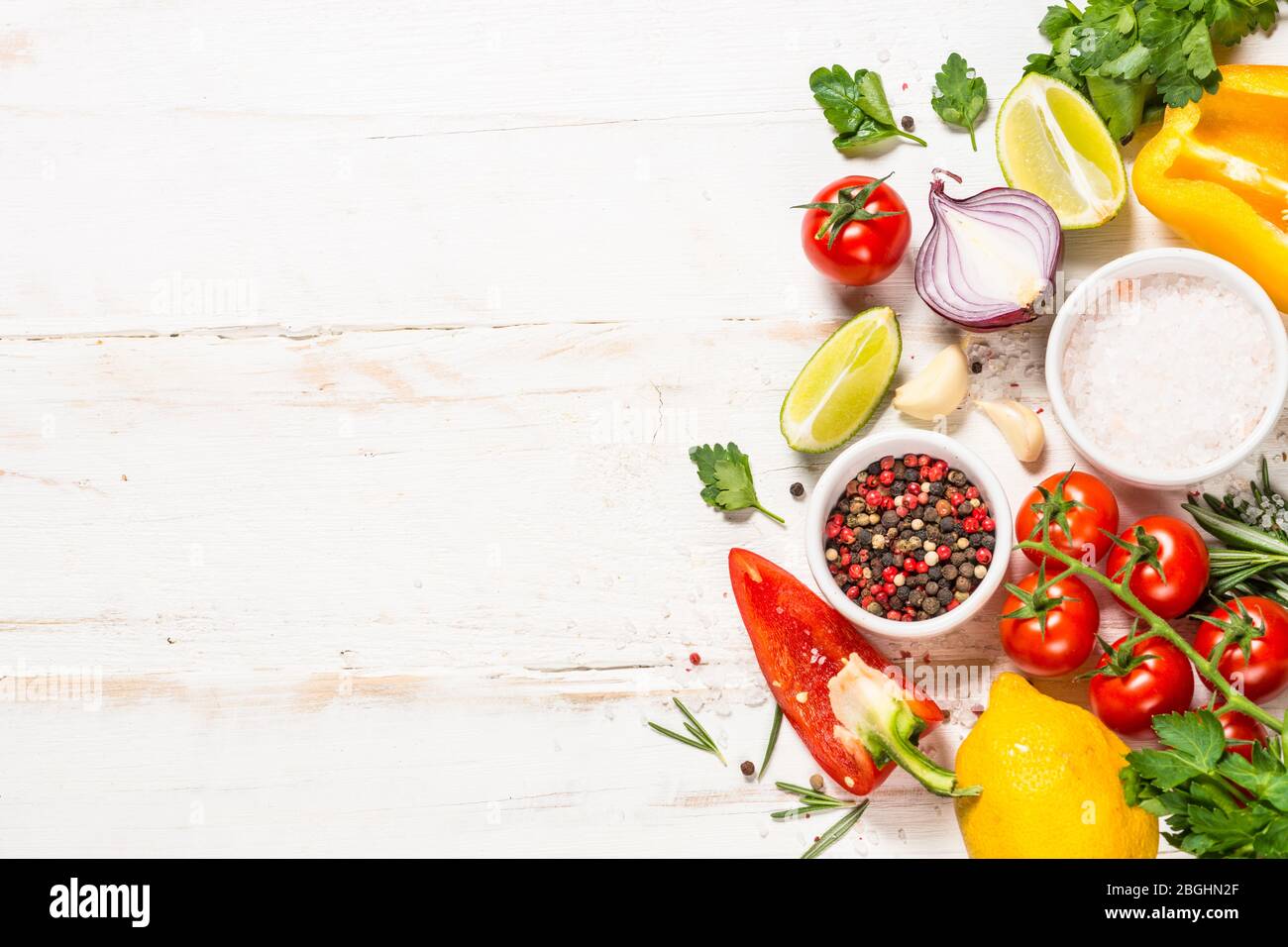 Food cooking background on white wooden table Stock Photo - Alamy