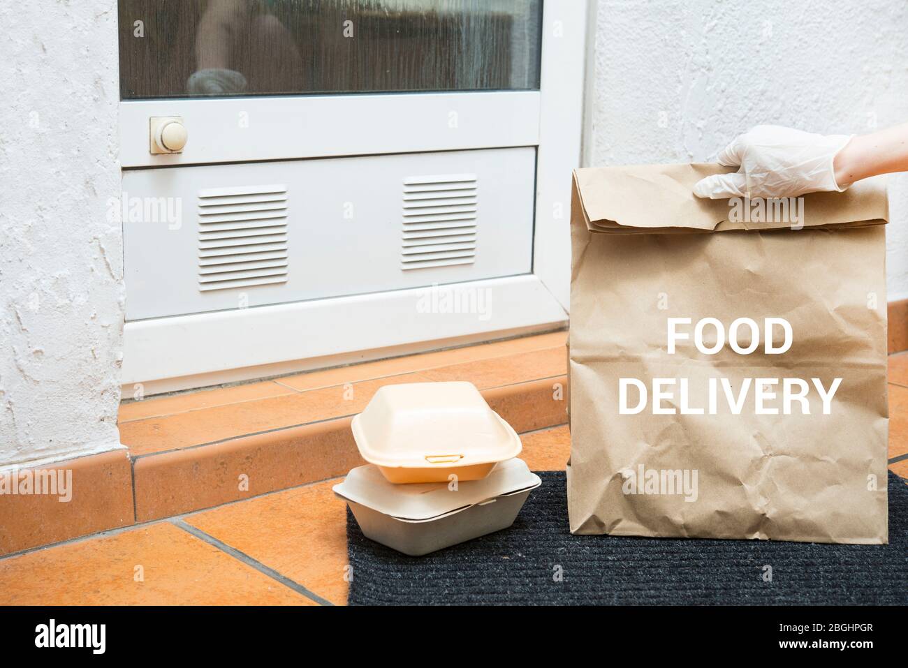 home delivery service, boxes standing by the house doors Stock Photo ...