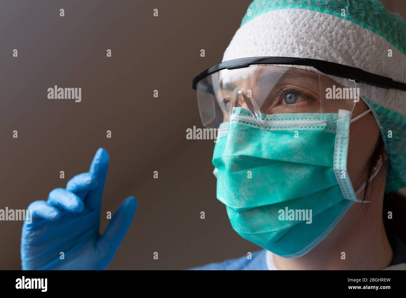 A nurse wearing a facial mask. Protection and hard working nurses ...