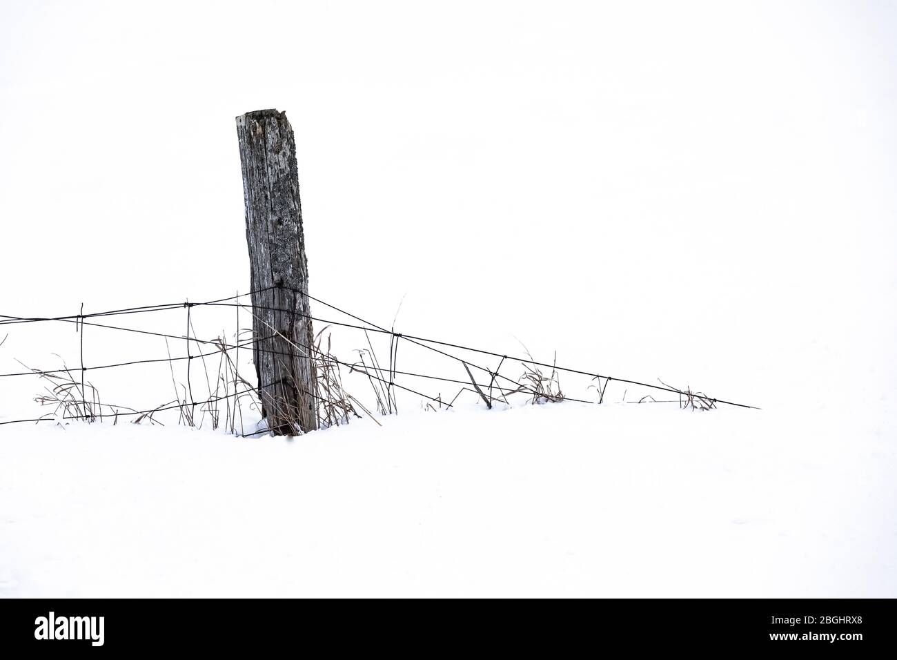 Fence and deep snow in the Upper Peninsula of Michigan, USA Stock Photo ...