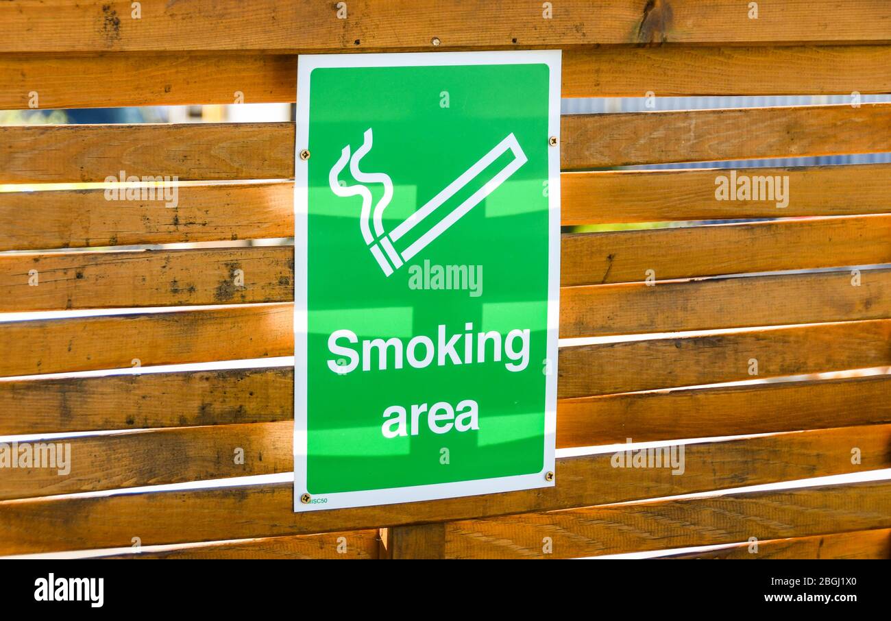 Designated smoking area sign hi-res stock photography and images - Alamy