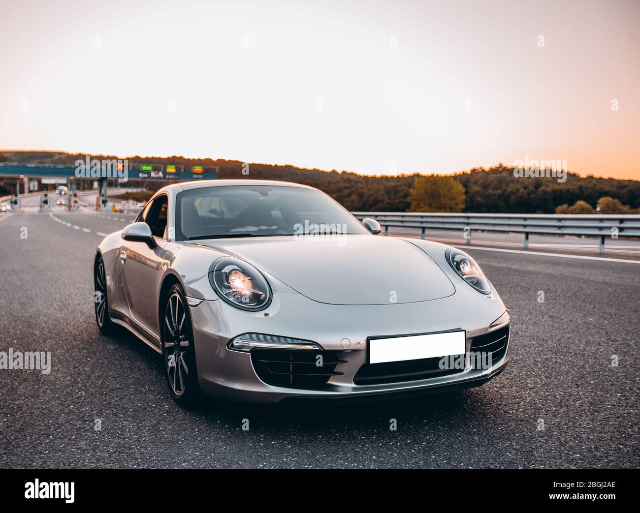 Silver metallic modern design supercar, front view Stock Photo - Alamy