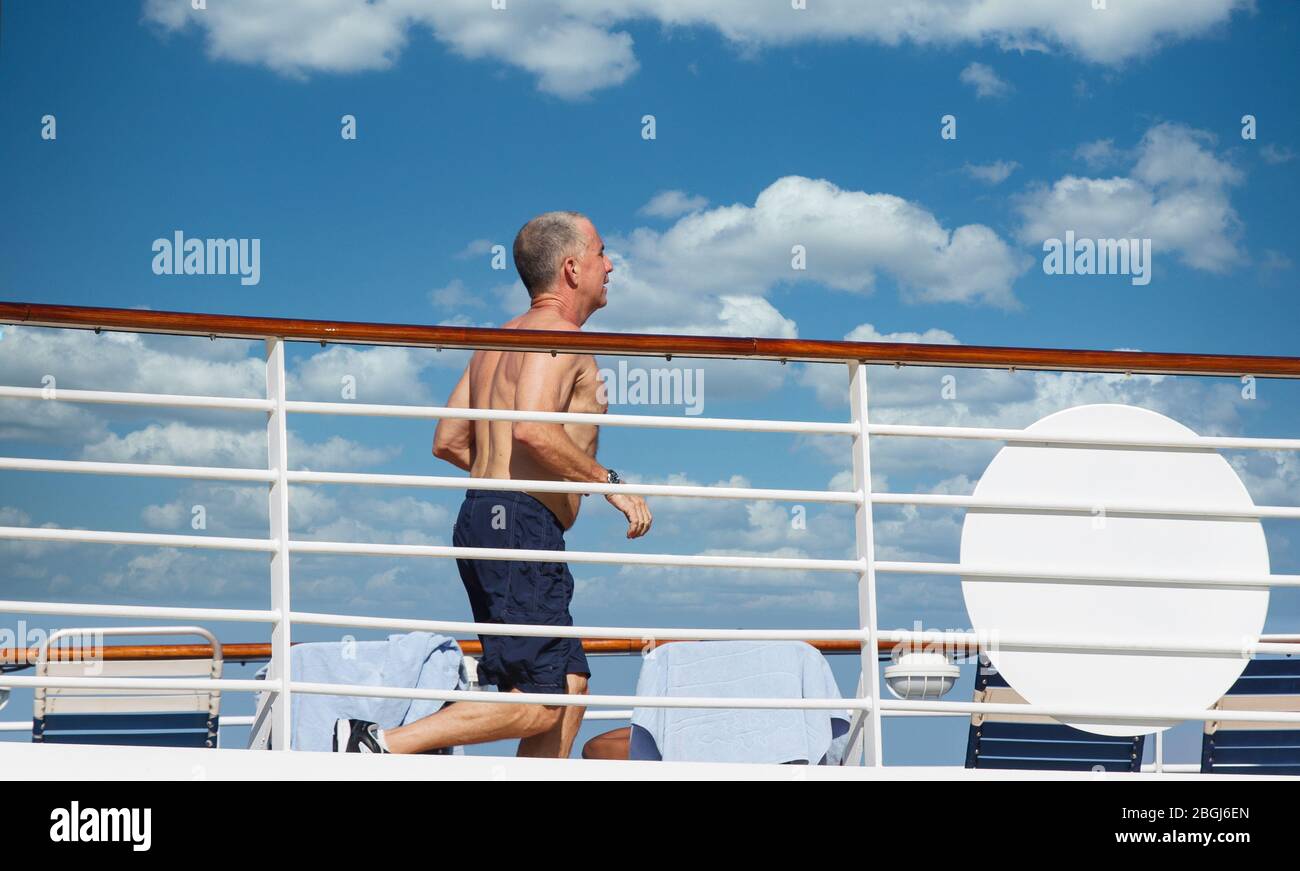 Man running on cruise ship hi-res stock photography and images - Alamy