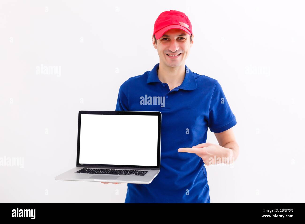 Laptop that is right for you. Handsome man hold laptop isolated on ...