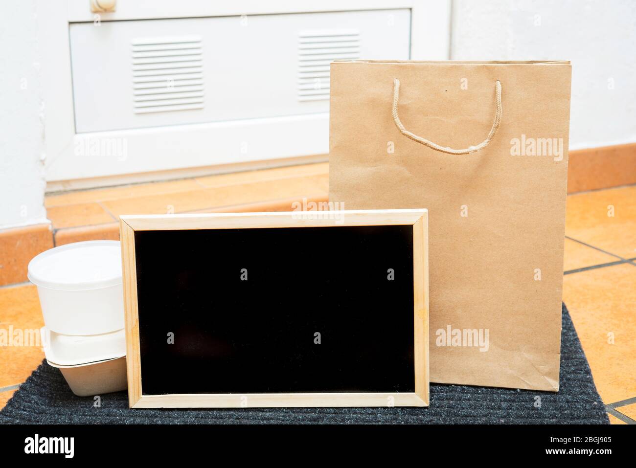 home delivery service, boxes standing by the house doors Stock Photo ...