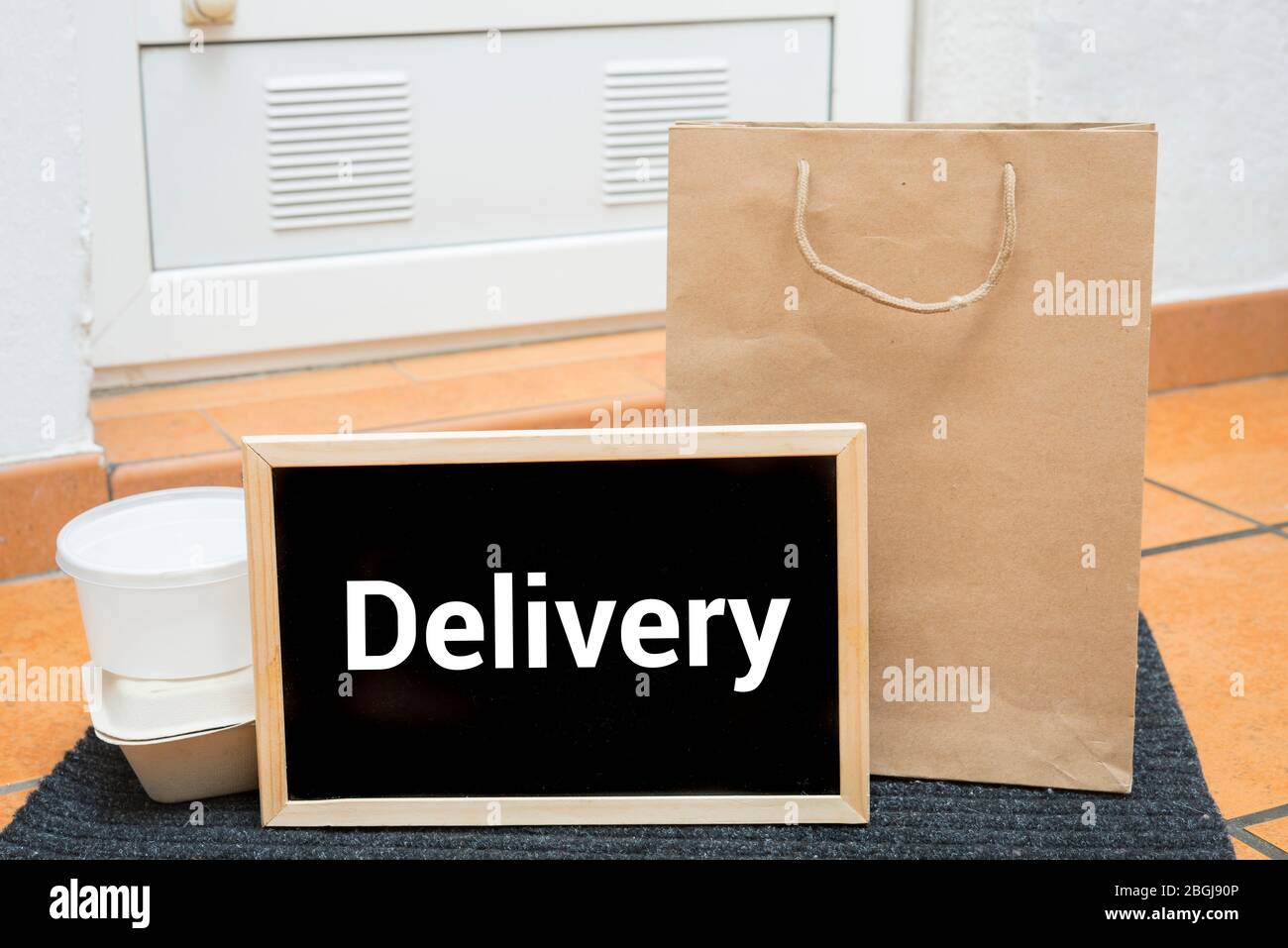 home delivery service, boxes standing by the house doors Stock Photo ...