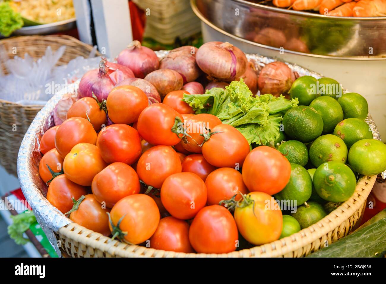 Big basket of vegetables at street bazaar Stock Photo - Alamy