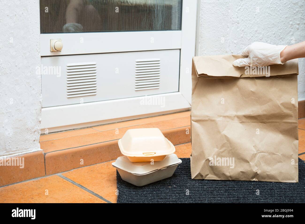 home delivery service, boxes standing by the house doors Stock Photo ...