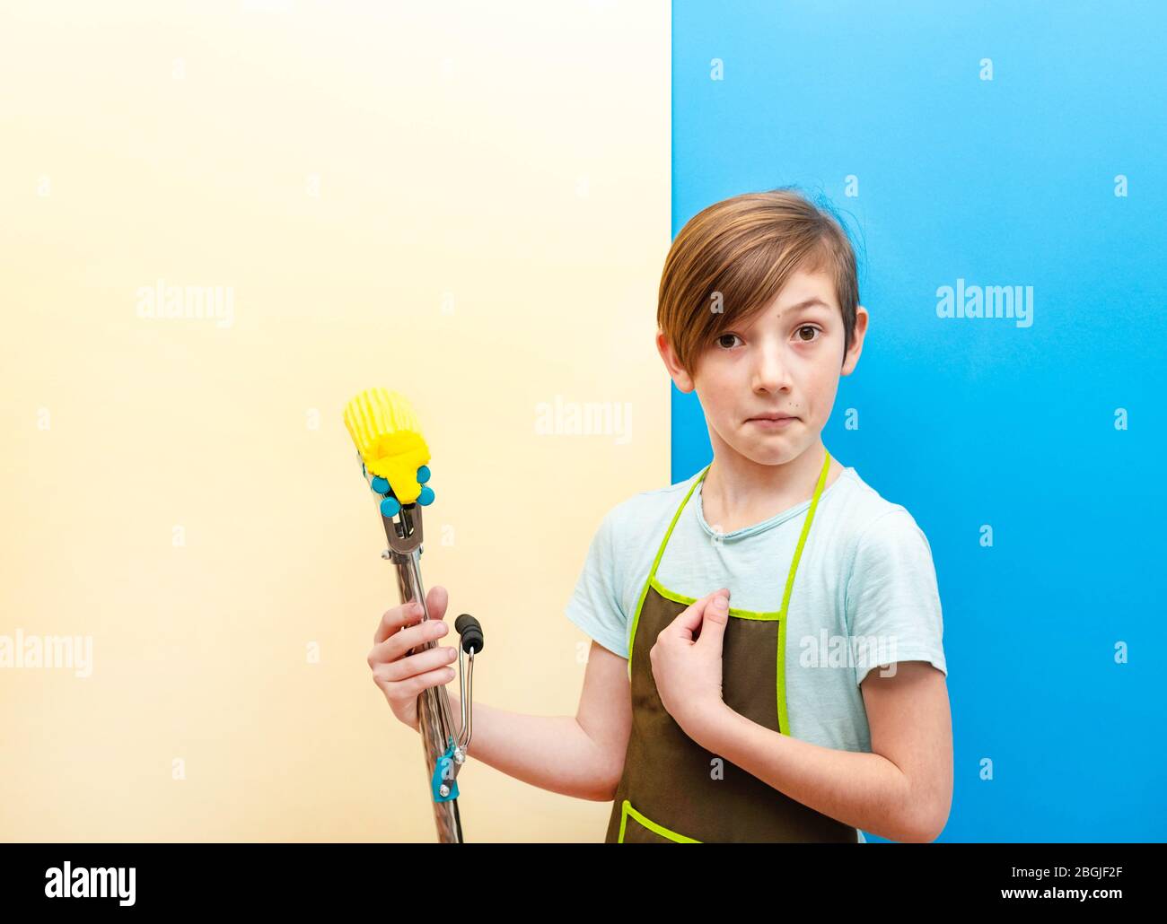 I need to clean. Surprise boy with a mop in his hands. Help in cleaning ...
